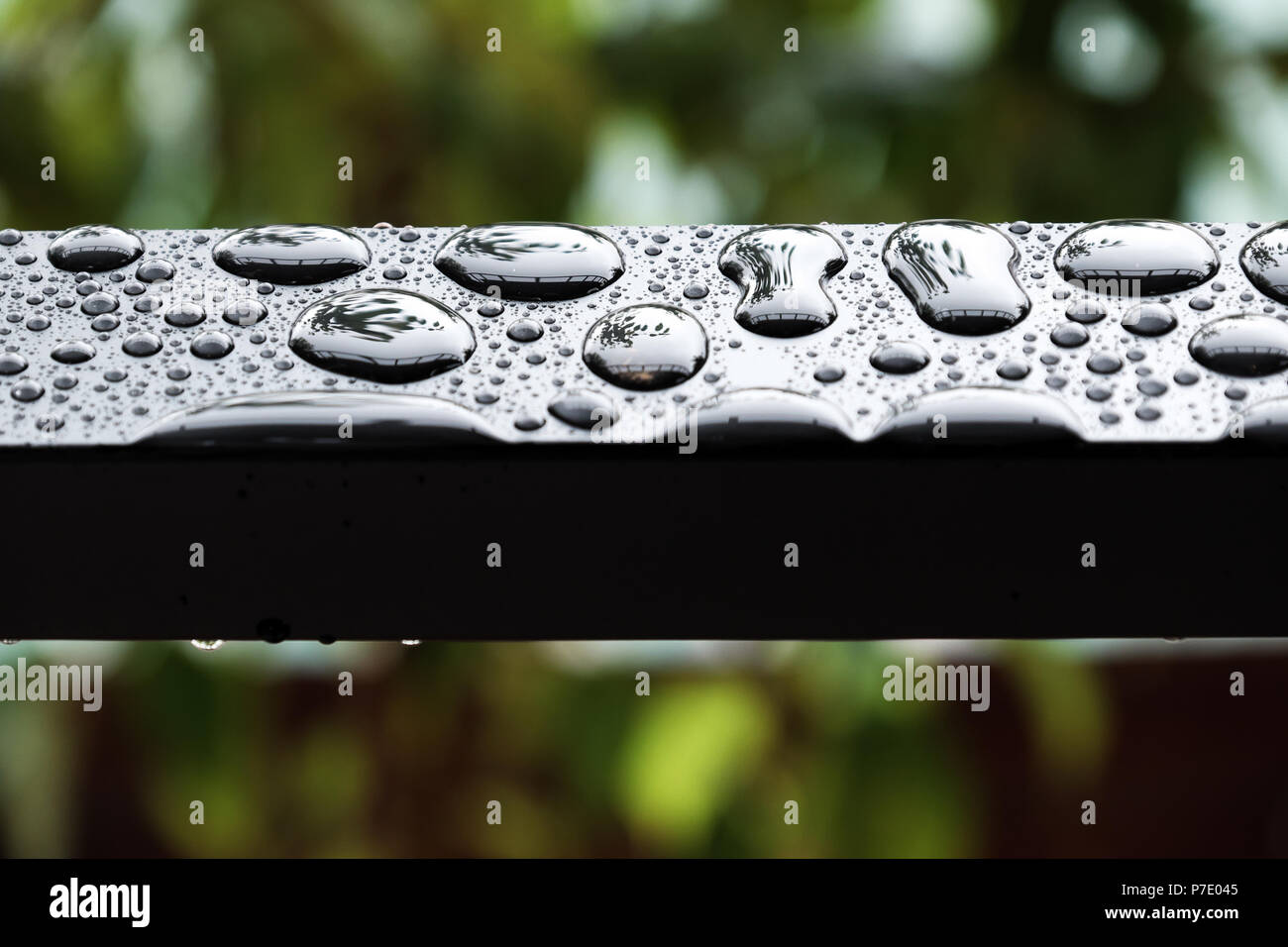 Amazing shape of rain drop on steel surface after rainy day, water ...
