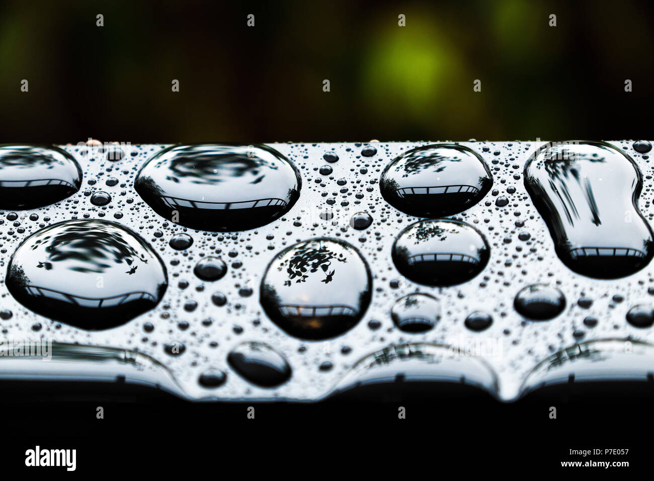 Amazing shape of rain drop on steel surface after rainy day, water ...