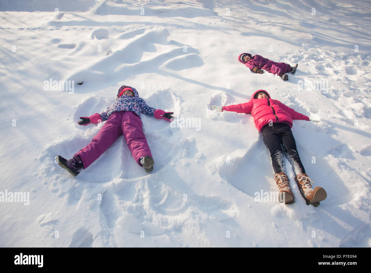 Girl and boy snow angel hi-res stock photography and images - Alamy