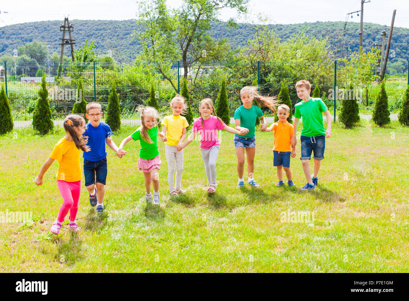 Small group kids standing together hi-res stock photography and images ...