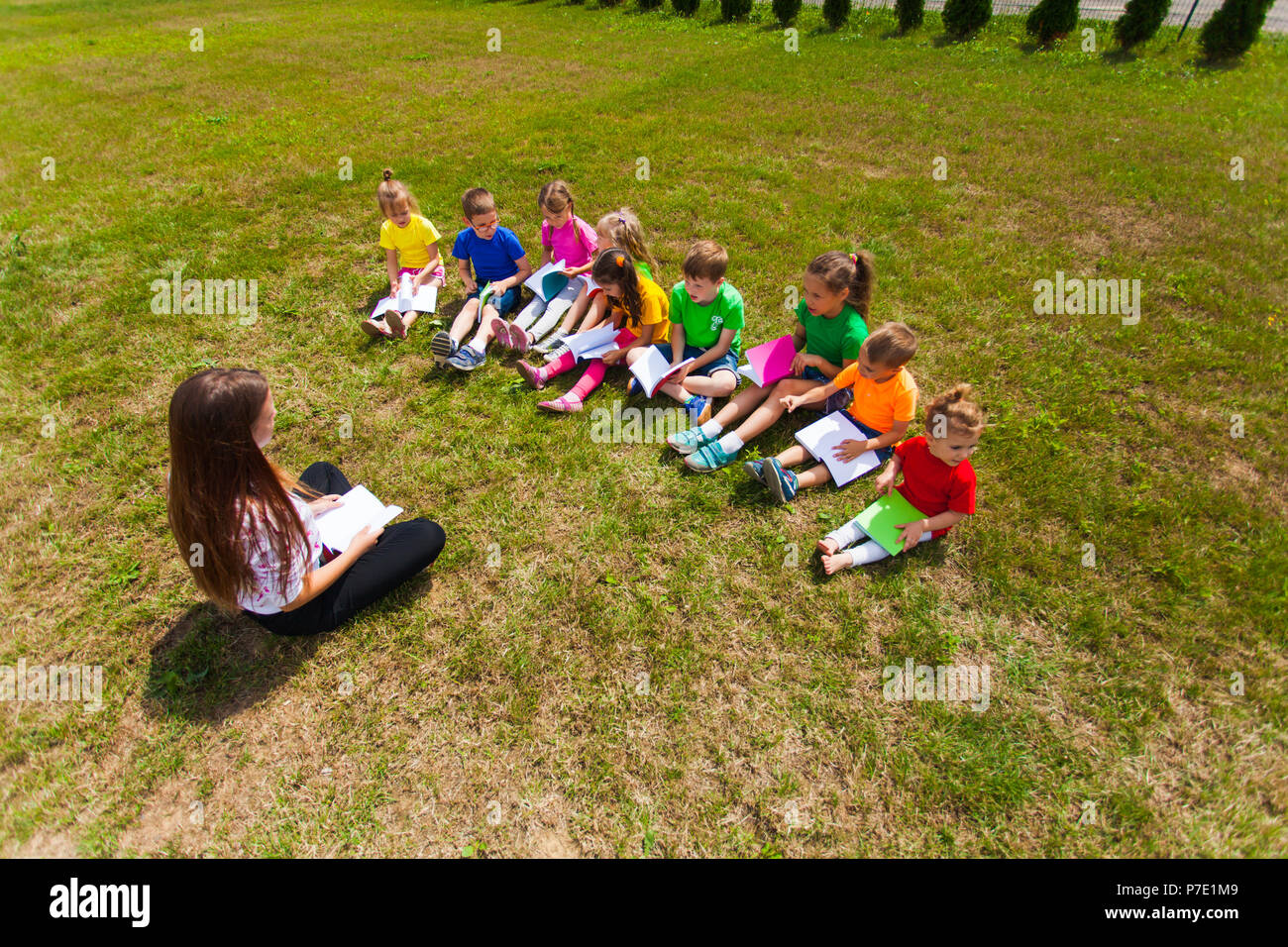 Kids in kindergarten learn to read Stock Photo - Alamy