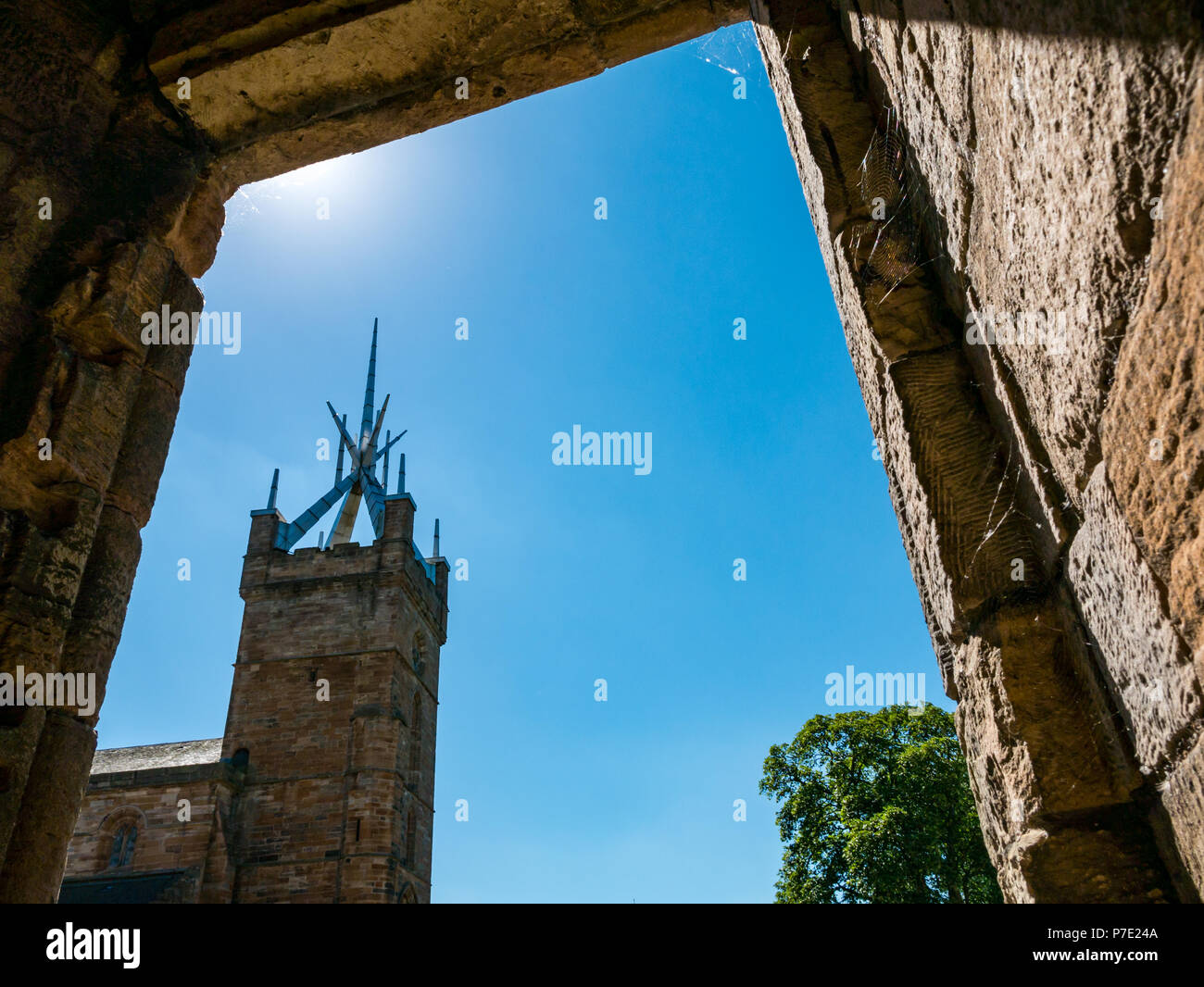 View of square tower with modern metal steeple, St Michael’s Parish ...