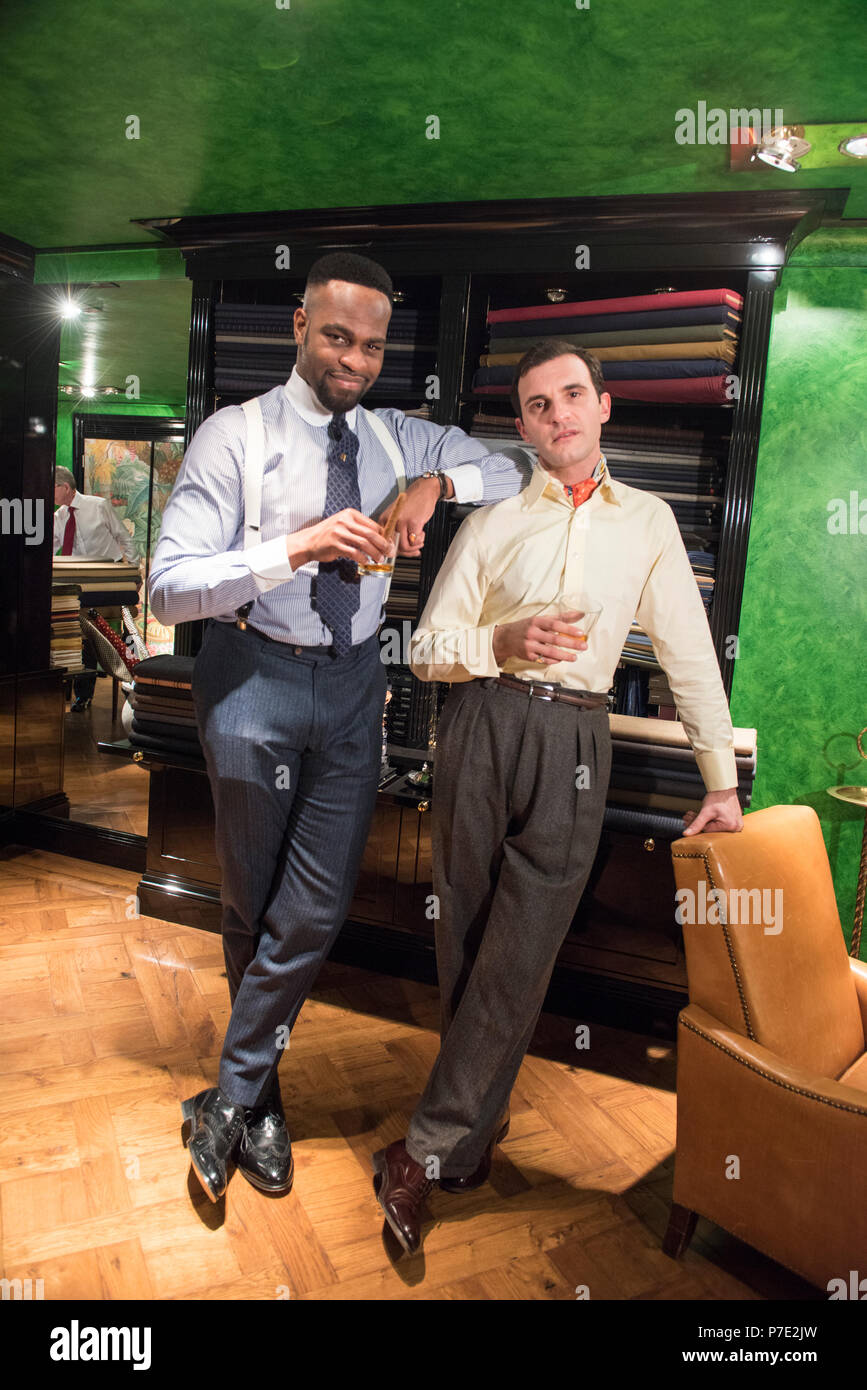 Two stylish tailors in tailors shop, portrait Stock Photo - Alamy