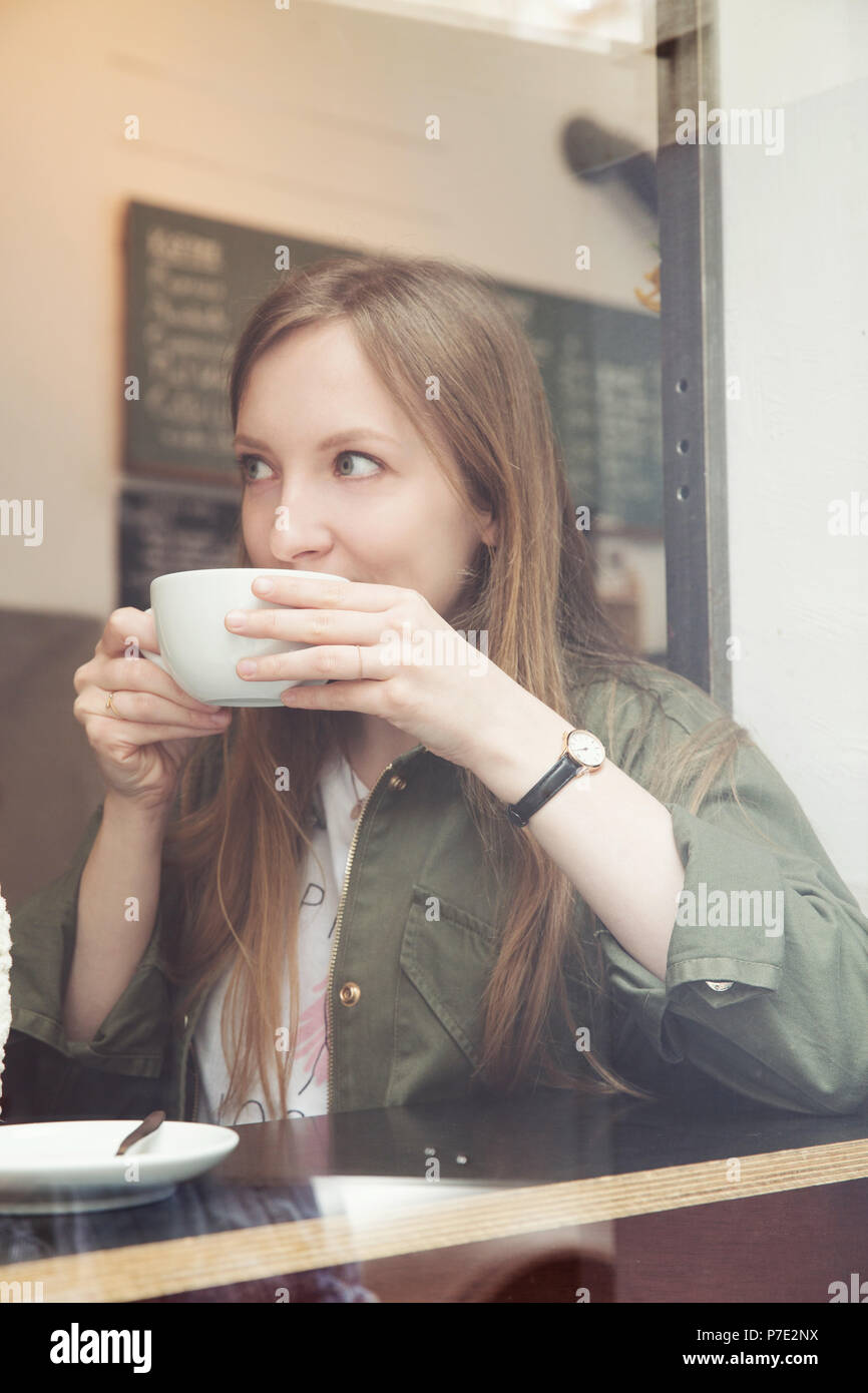 Women in cafe having coffee hi-res stock photography and images - Alamy