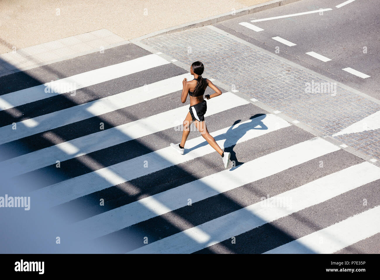 Woman on pedestrian crossing hi-res stock photography and images - Alamy