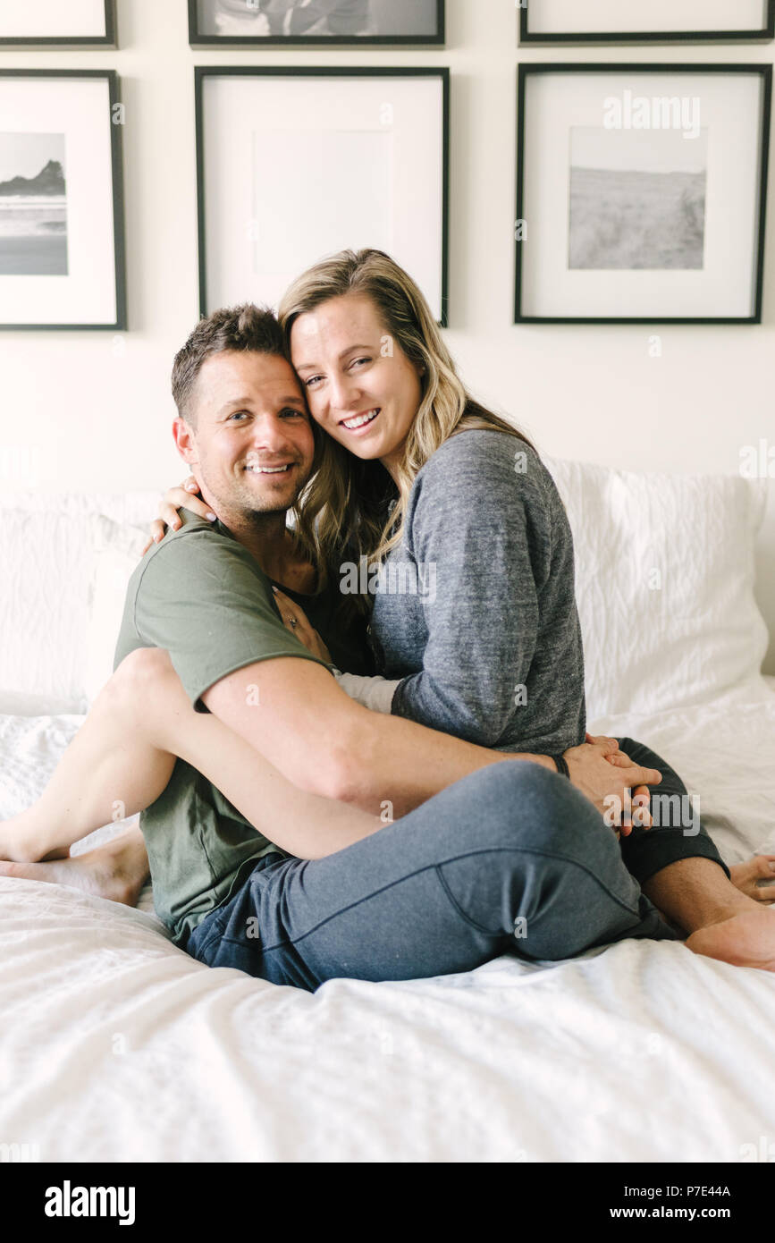Woman sitting on mans lap hi-res stock photography and images - Alamy