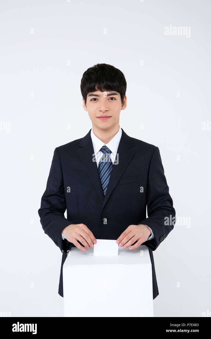 RF Photos- take a vote, the man is voting isolated on white background ...