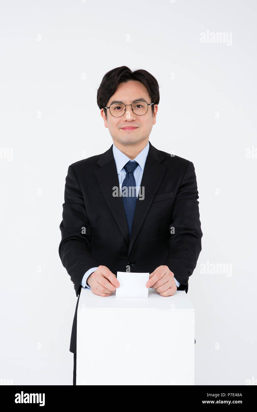 RF Photos- take a vote, the man is voting isolated on white background ...