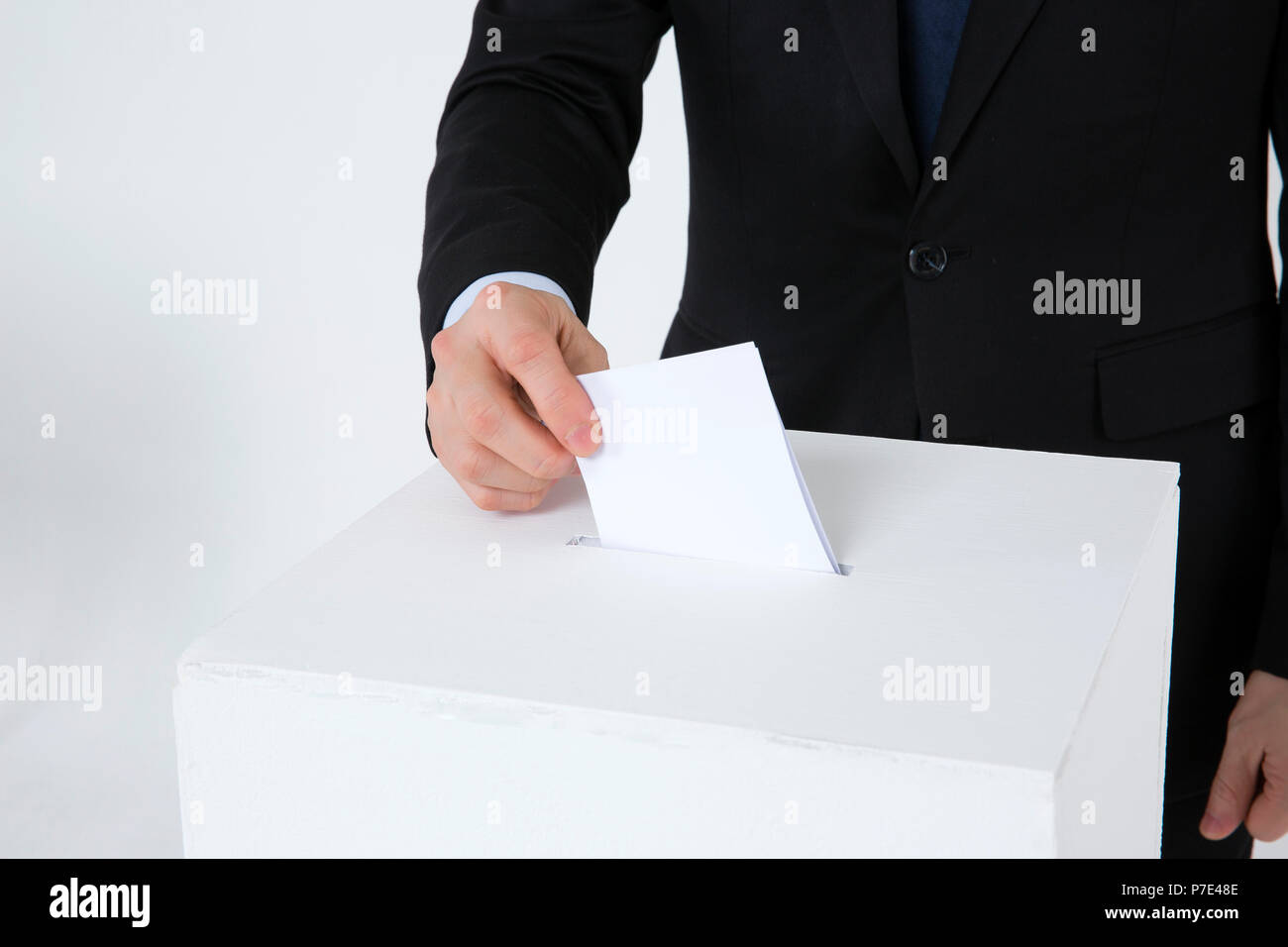 RF Photos- take a vote, the man is voting isolated on white background ...