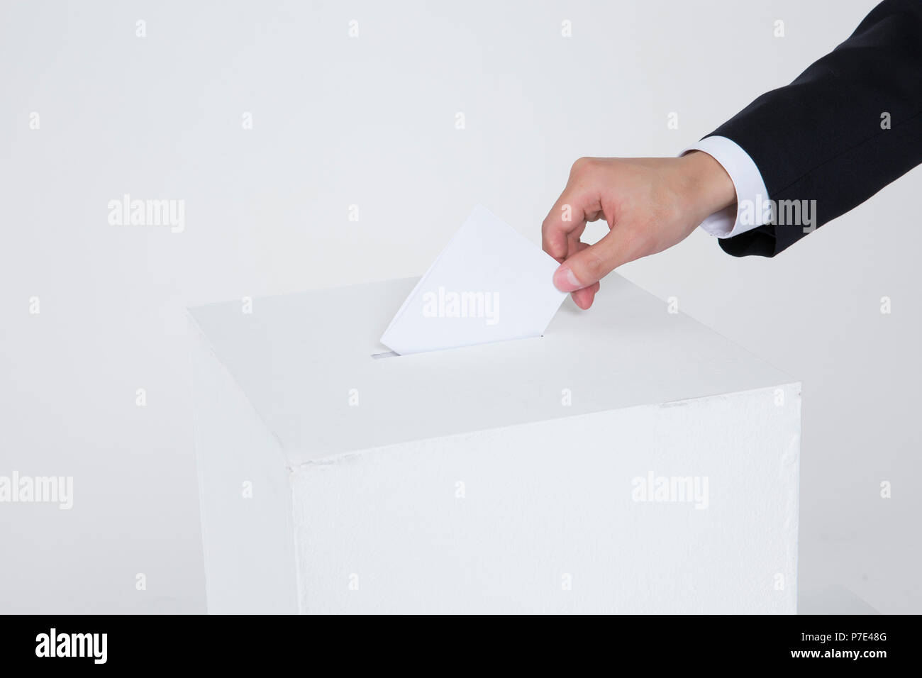 RF Photos- take a vote, the man is voting isolated on white background ...