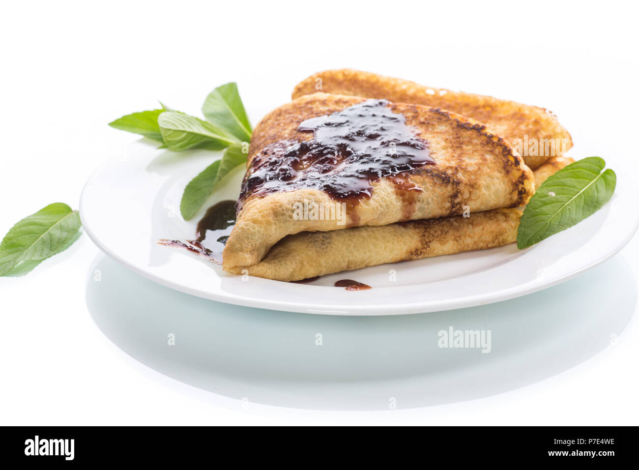 Pancakes jam on plate Cut Out Stock Images & Pictures - Alamy