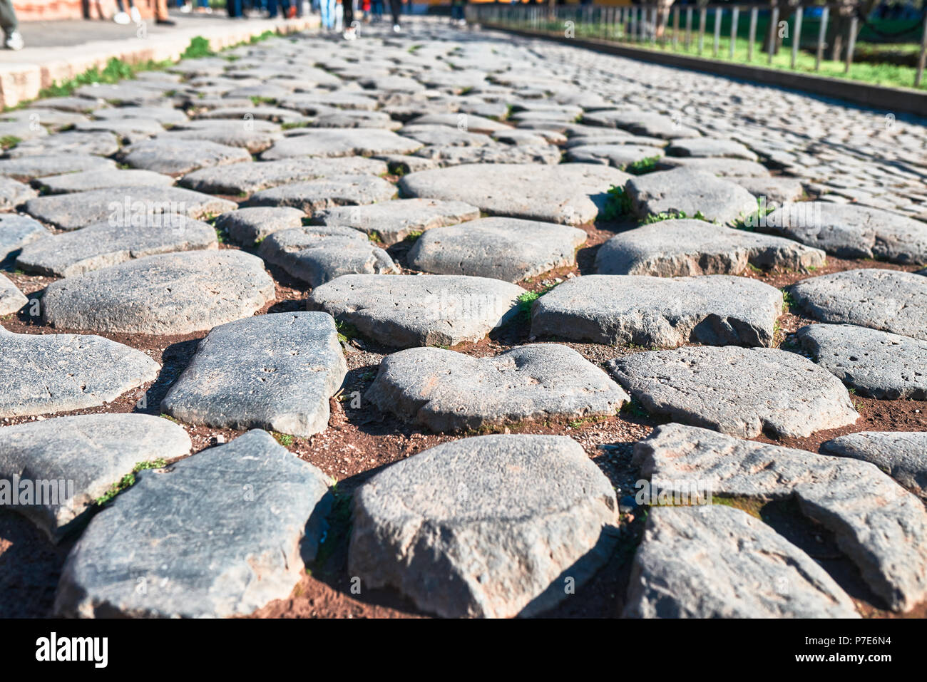 Rome, antique Roman road in cobblestones Stock Photo - Alamy