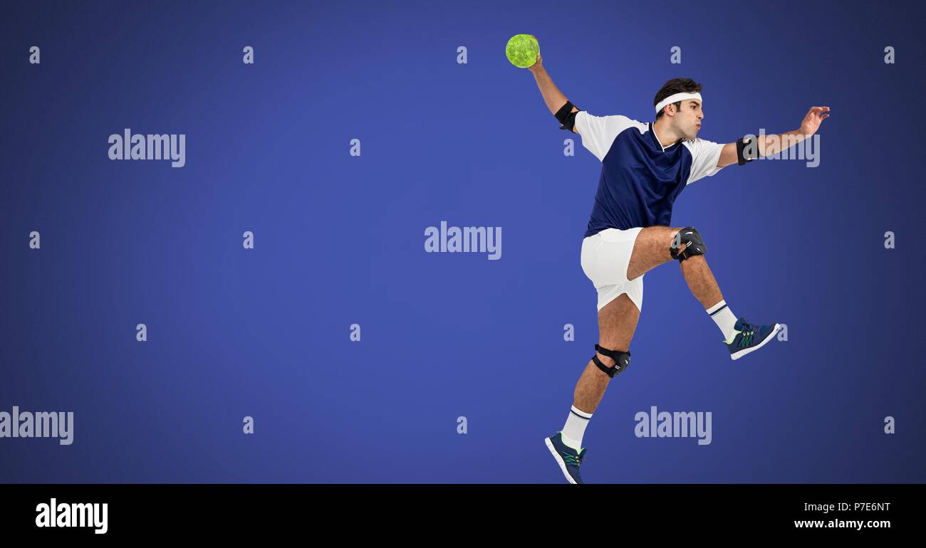 Handball man with blank blue background Stock Photo - Alamy