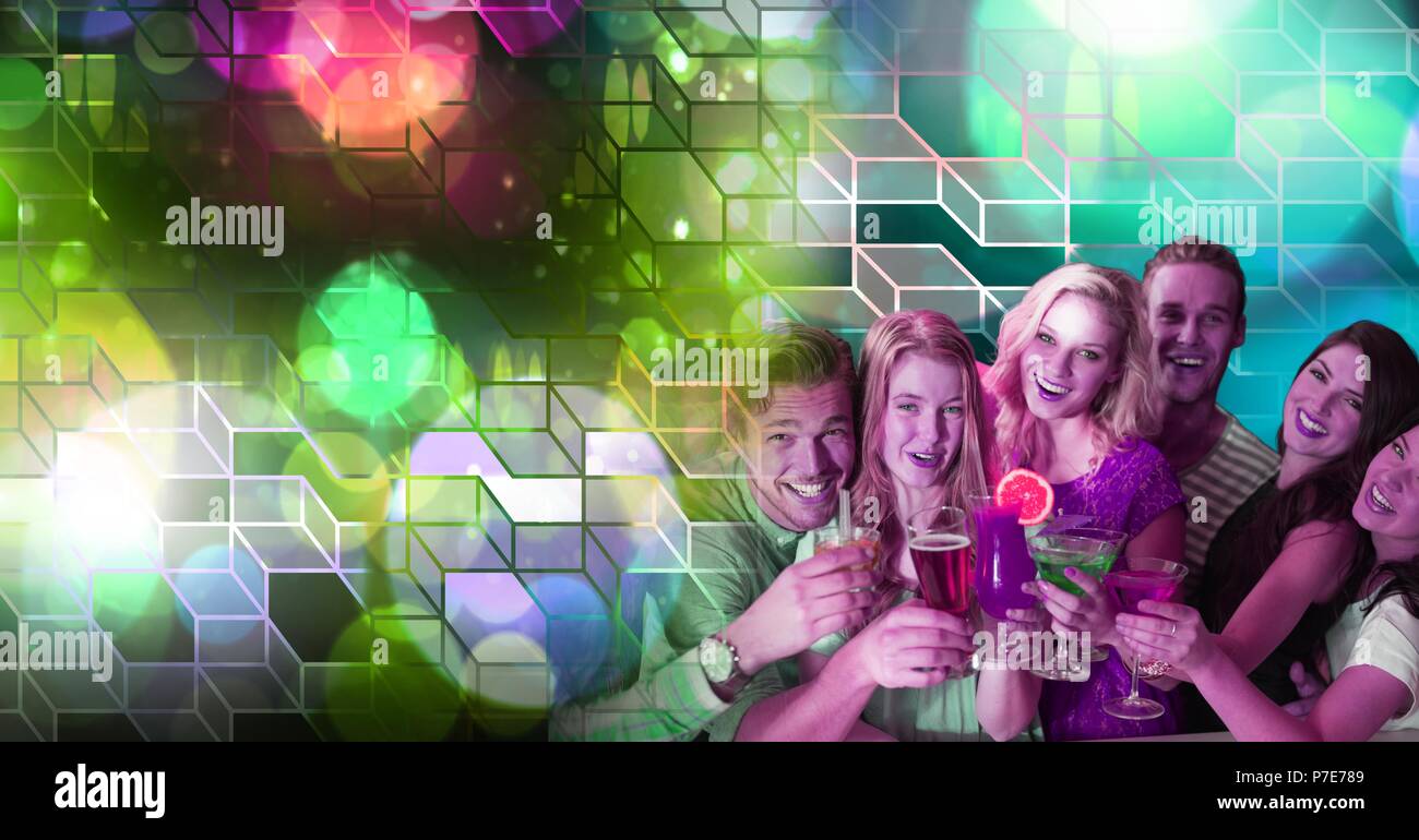 Fun friends drinking cocktails with geometric party lights venue ...