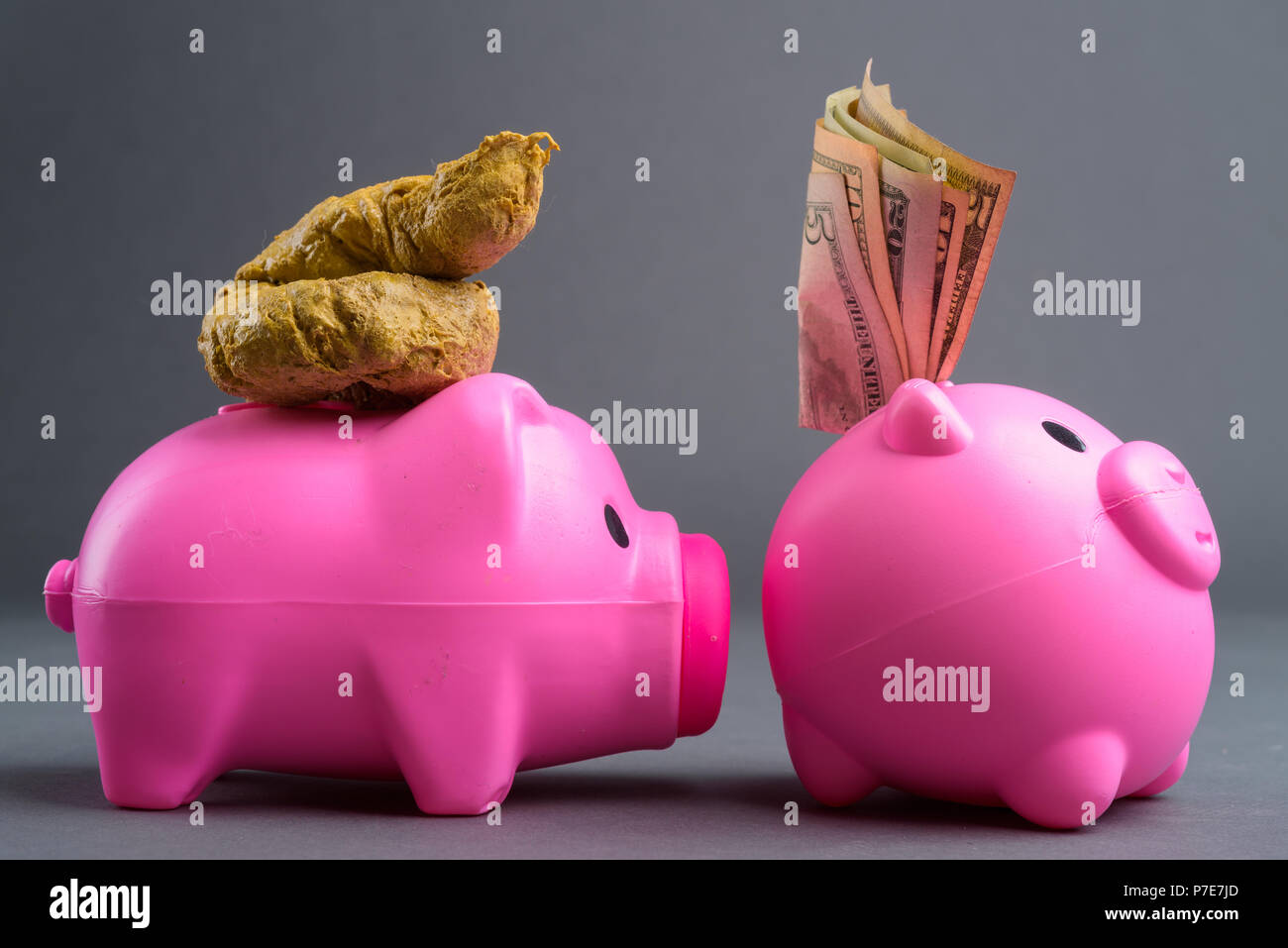Two Piggy Banks In A Row Stock Photo - Alamy