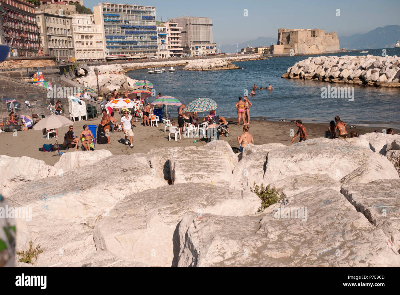People bathing in Naples Stock Photo - Alamy