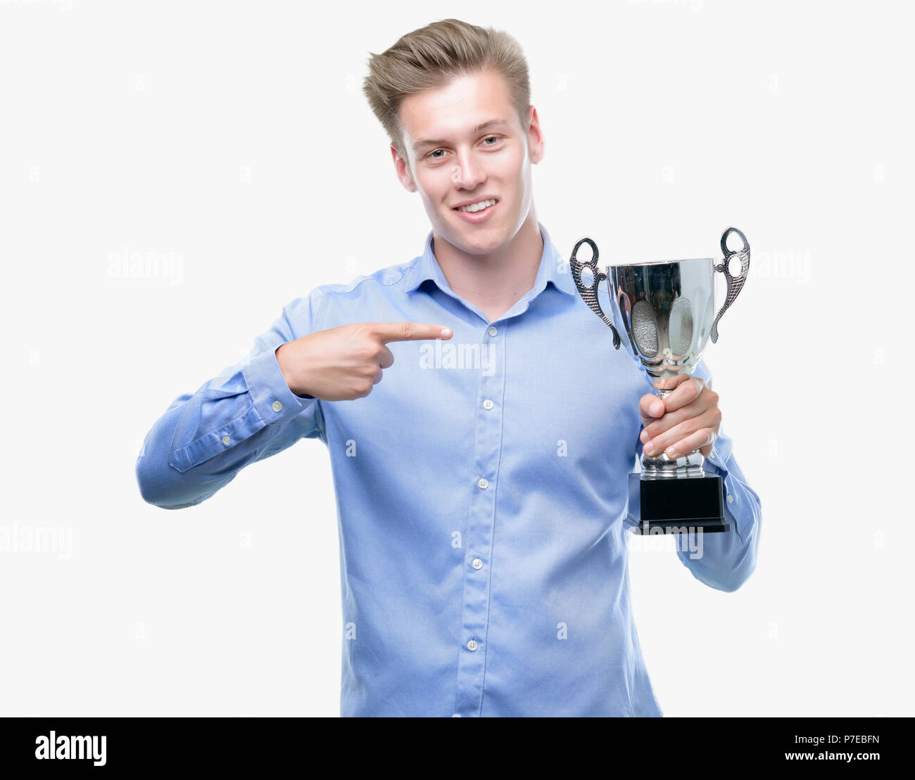 Boy holding up a trophy hi-res stock photography and images - Alamy