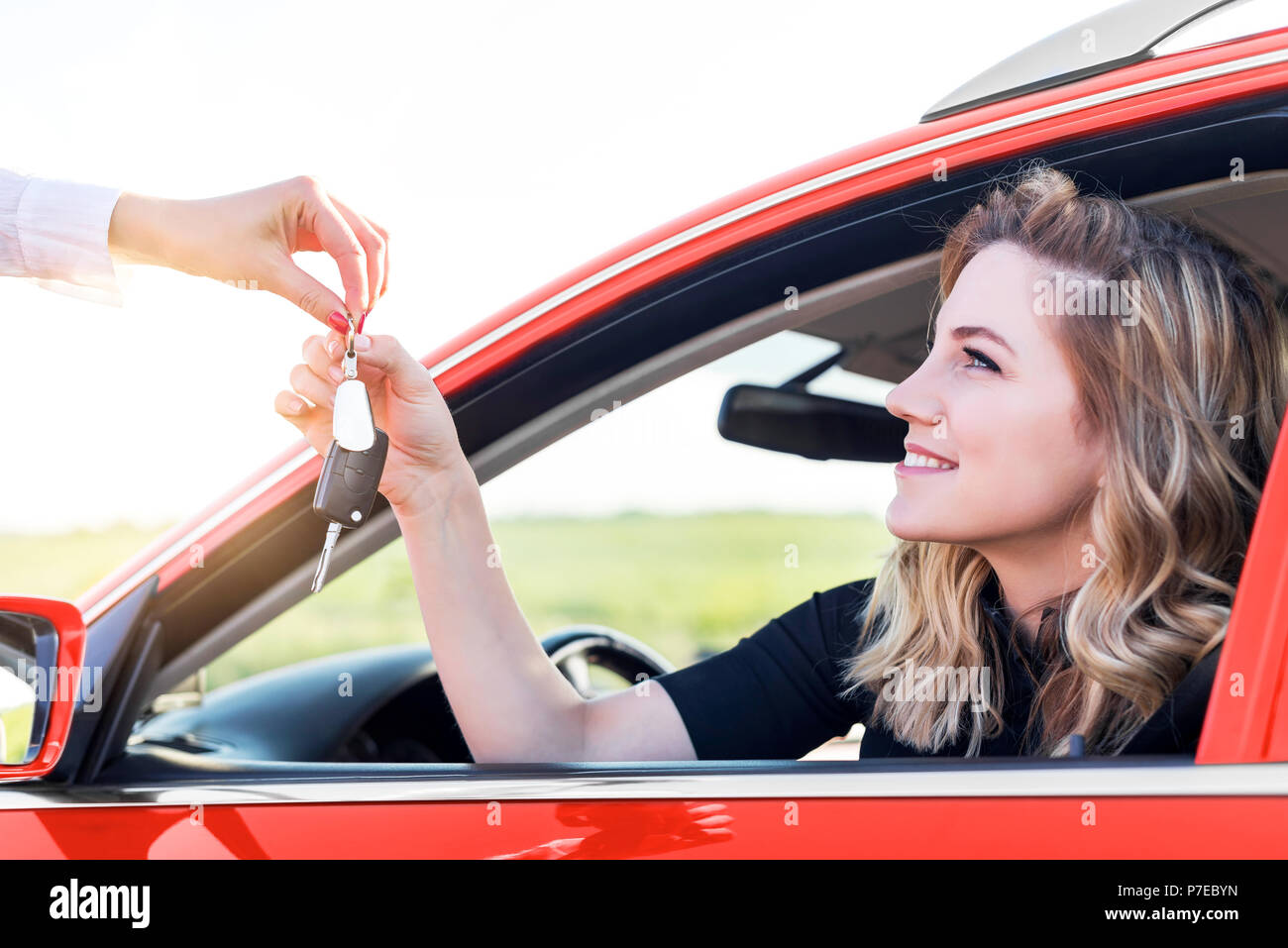 Happy girl keys hi-res stock photography and images - Alamy