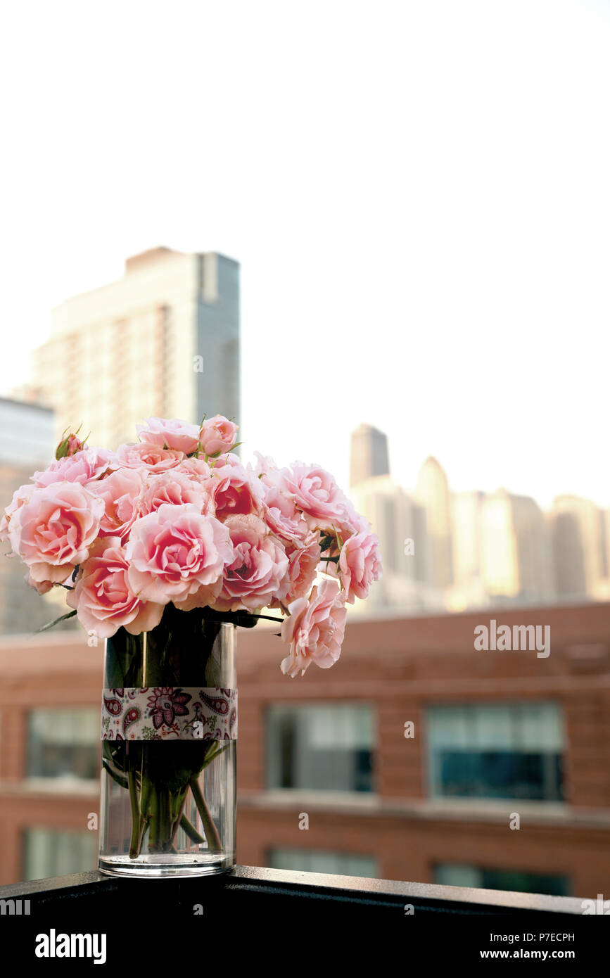 Bouquet of roses on the terrace hi-res stock photography and images - Alamy
