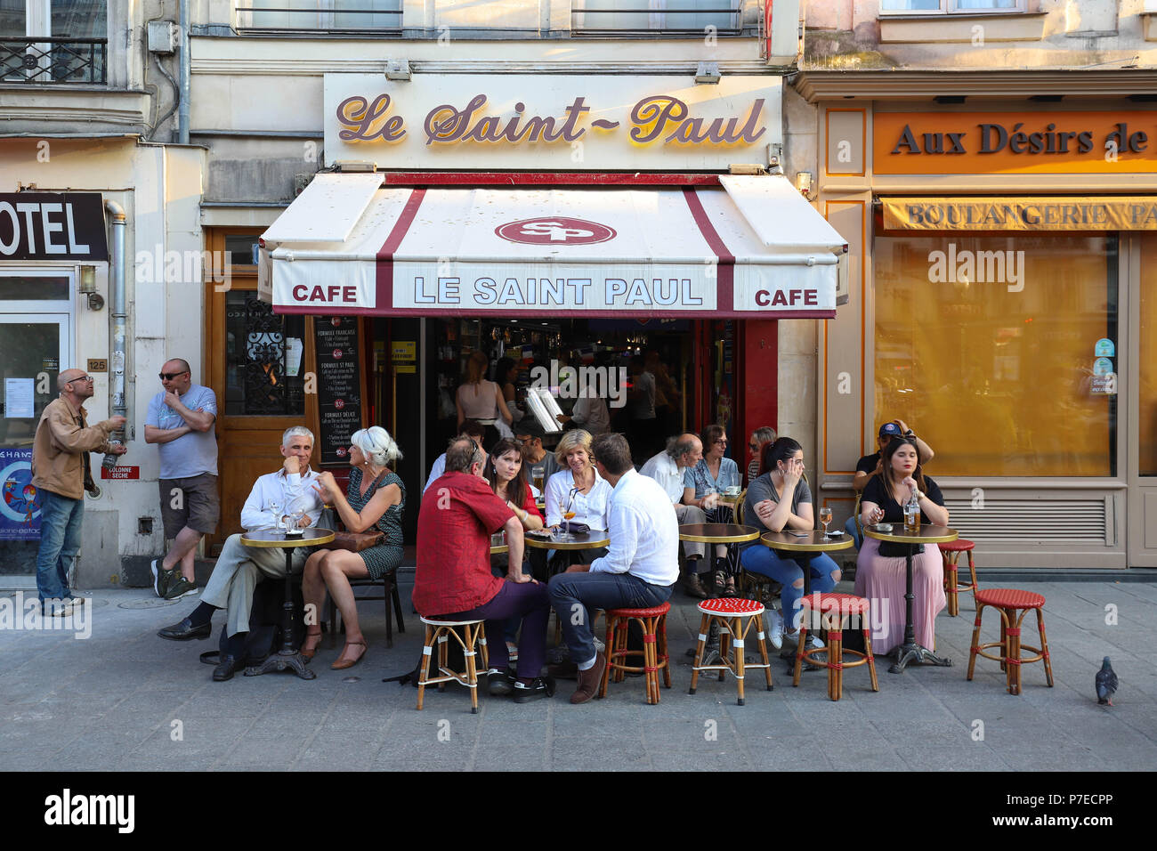 View of typical French cafe Saint Paul in the quarter Marais, the ...