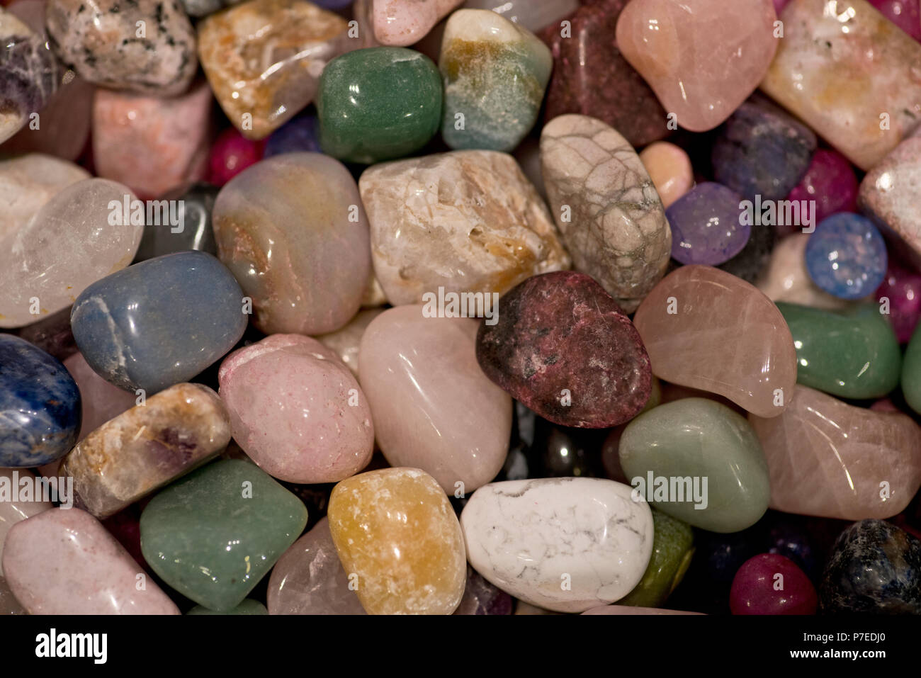 Colorful polished semi precious gemstones detail background texture ...