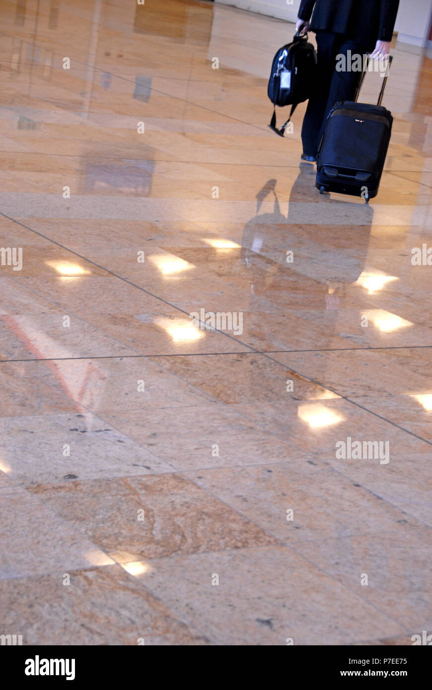 Person walking alone through empty airport check in at Doncaster ...