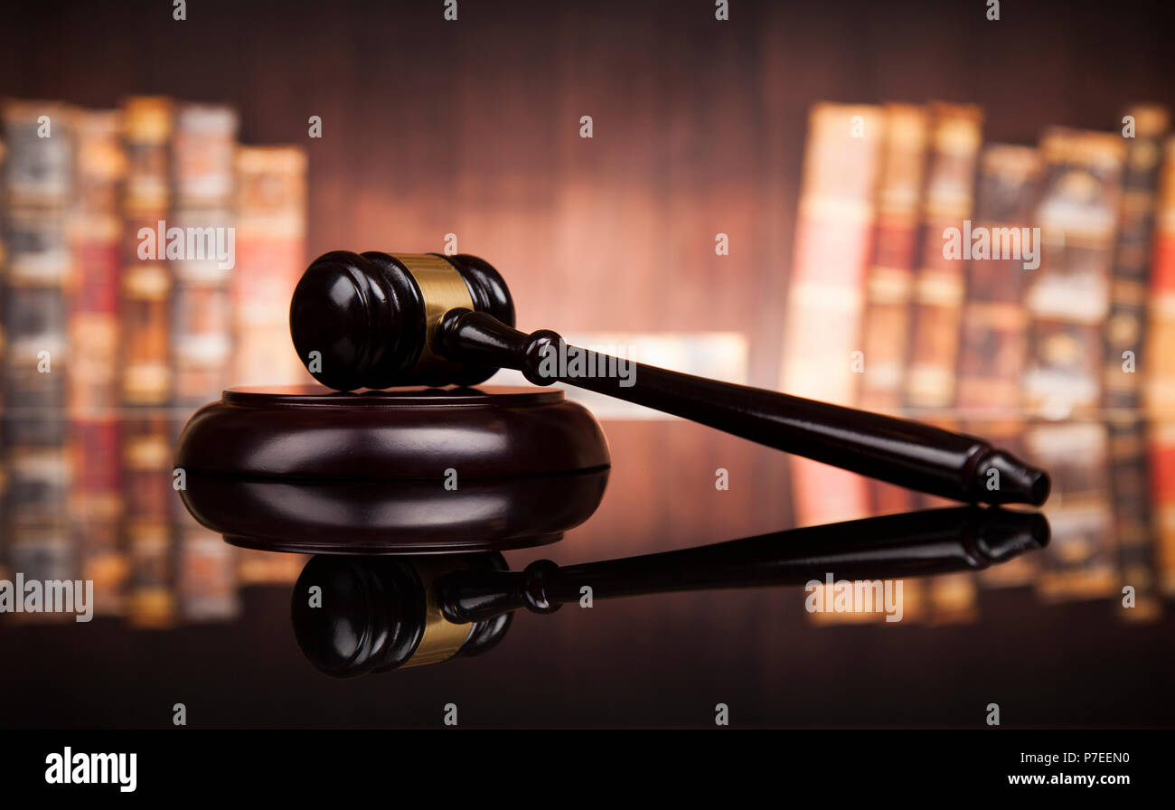 law theme, mallet of the judge, justice scale, books, wooden desk Stock Photo - Alamy