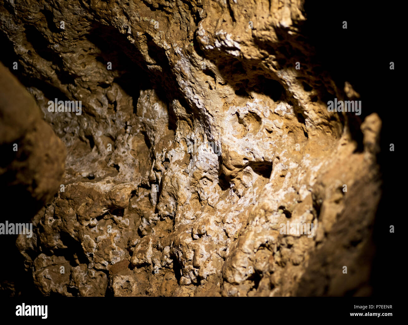 Sheets of flowstone covering the walls of the cave of the Mounds, a ...