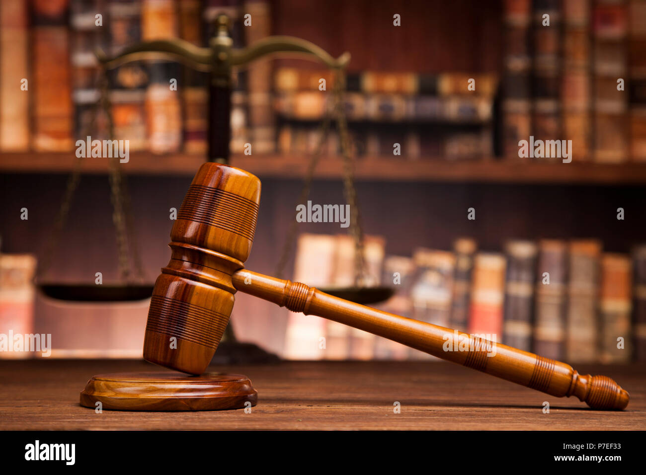 law theme, mallet of the judge, justice scale, books, wooden desk Stock Photo - Alamy