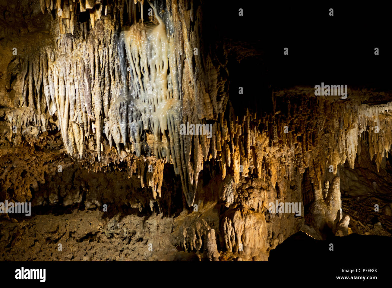 Stalactites and stalagmites inside natural limestone cave. Natural ...