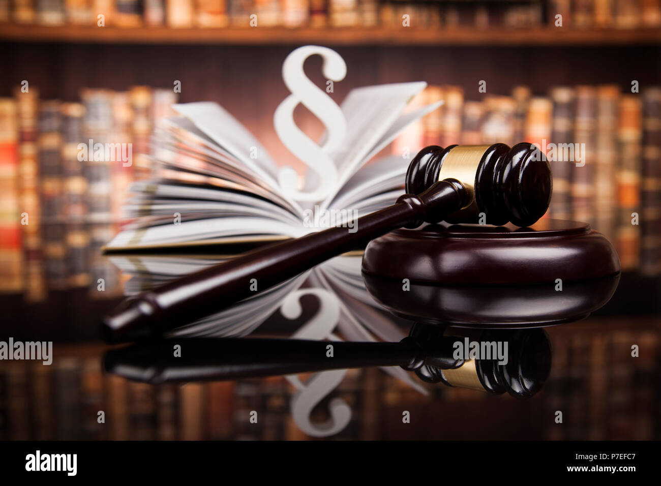 law theme, mallet of the judge, justice scale, books, wooden desk Stock Photo - Alamy
