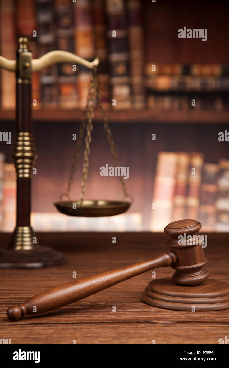 law theme, mallet of the judge, justice scale, books, wooden desk Stock Photo - Alamy