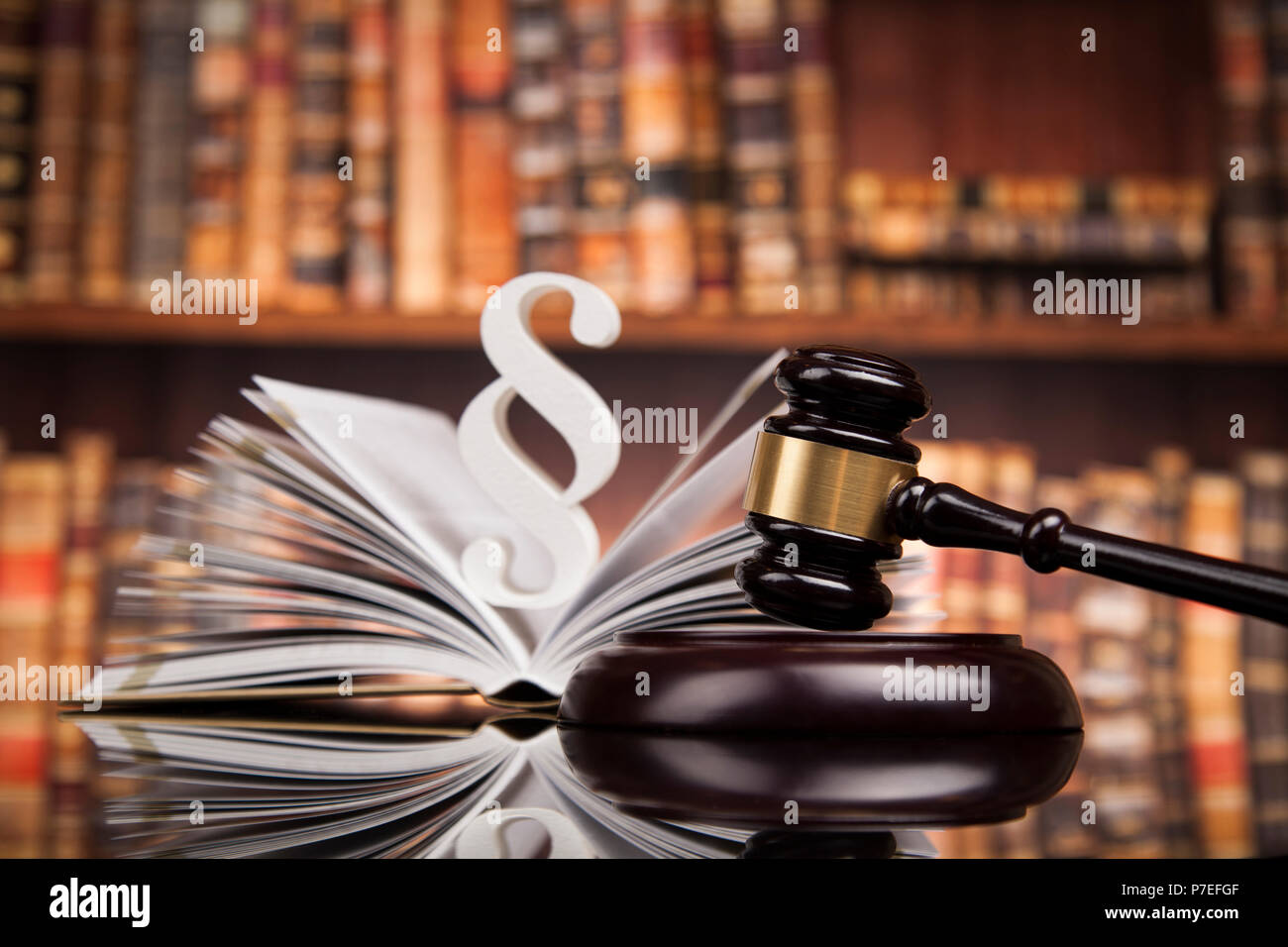 Judge gavel and scales of justice and book background Stock Photo - Alamy