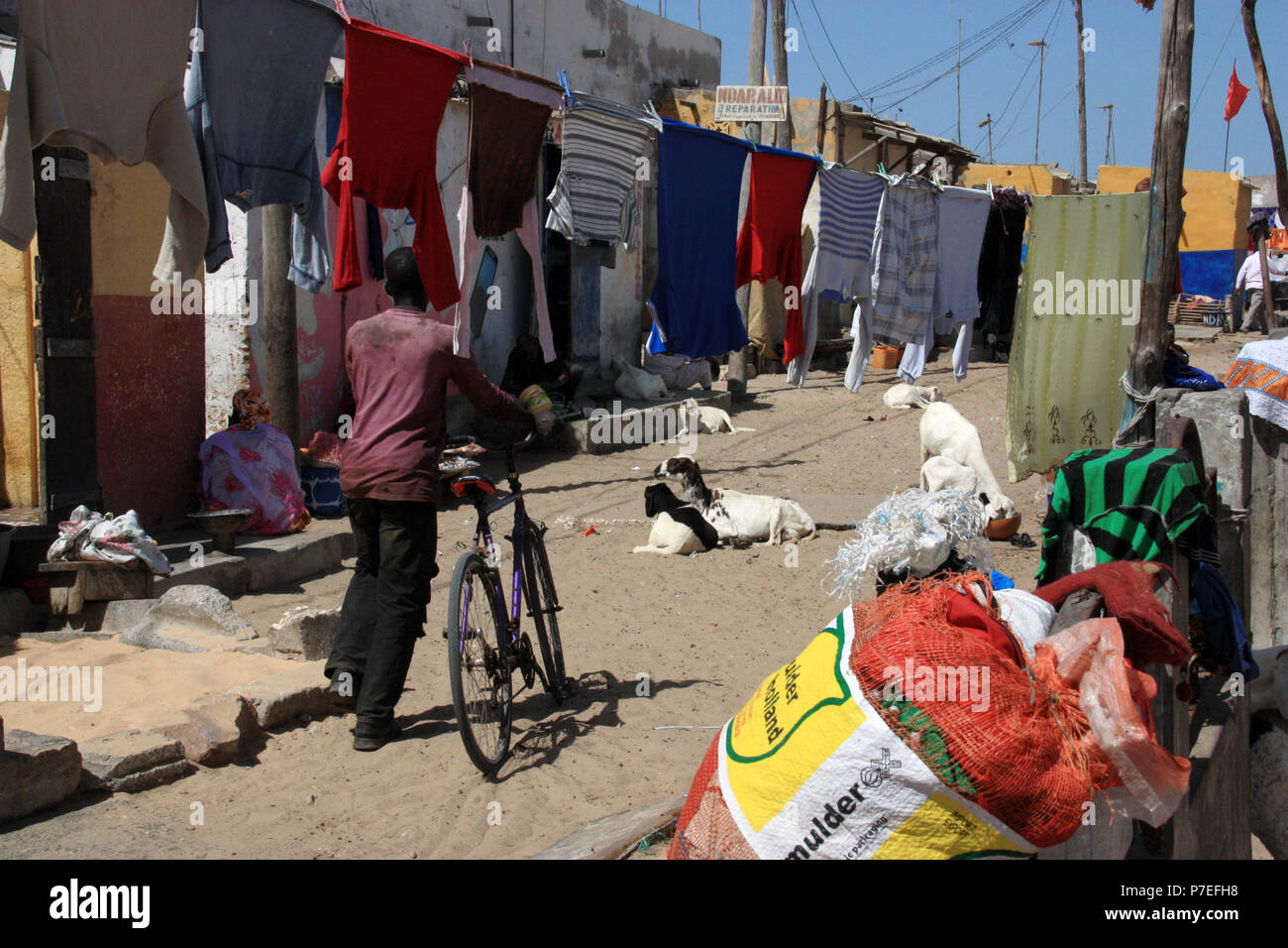 Laundry drying on a washing line in front of a family house in Saint ...