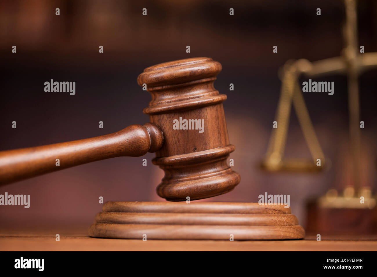 Judge gavel and scales of justice and book background Stock Photo - Alamy
