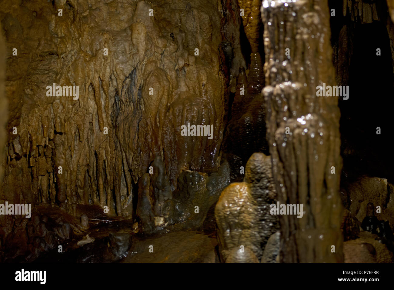 Stalactites and stalagmites inside natural limestone cave. Natural ...