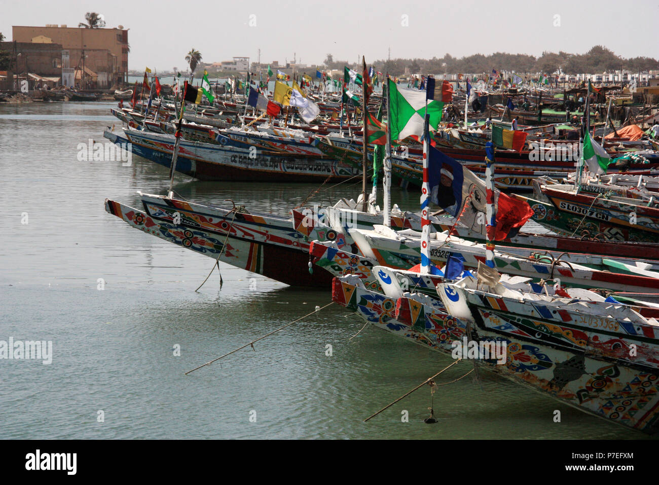 Colorful painted pirogues in the fisherman's wharf of Saint-Louis-du ...