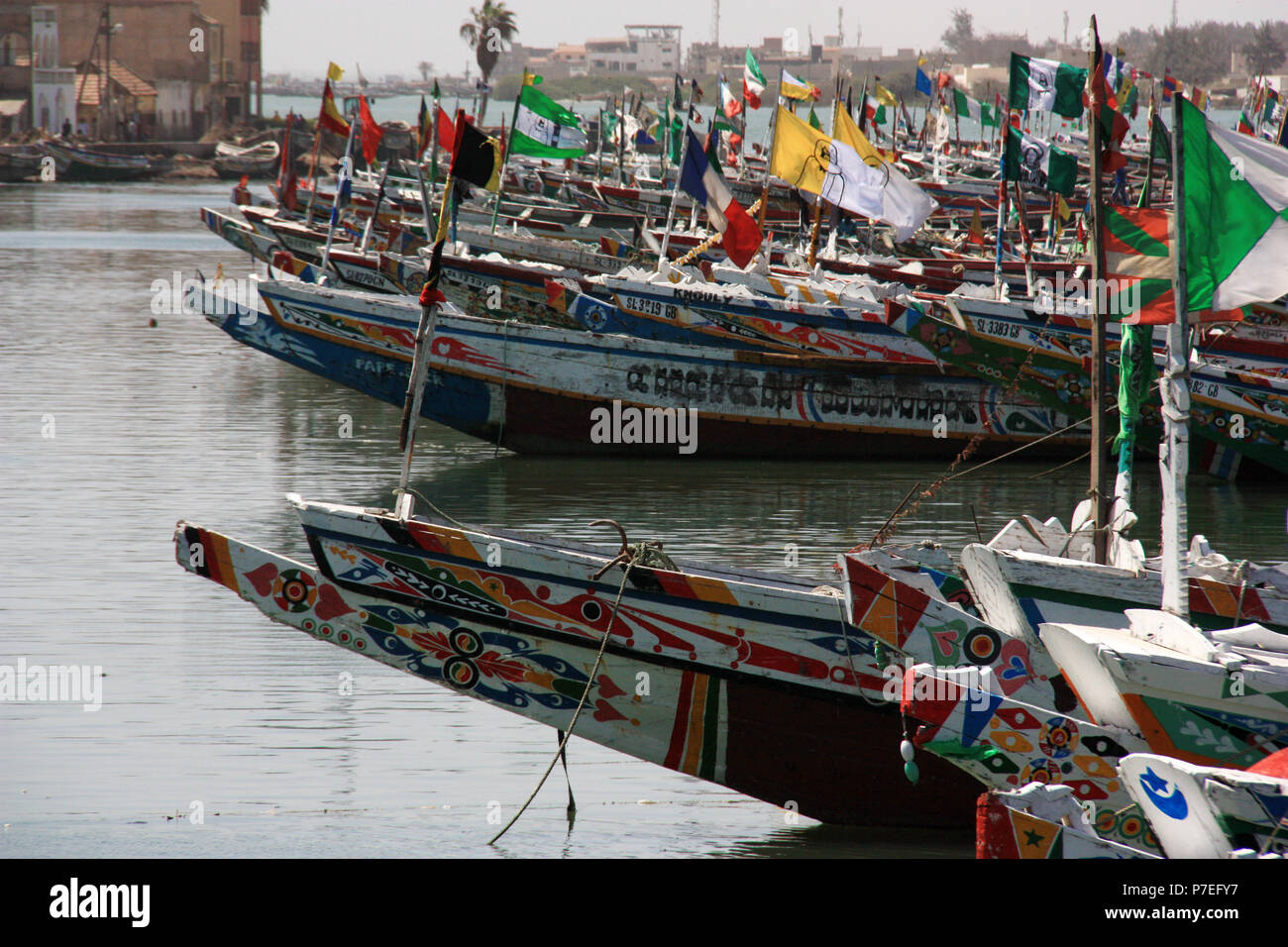 Colorful painted pirogues in the fisherman's wharf of Saint-Louis-du ...