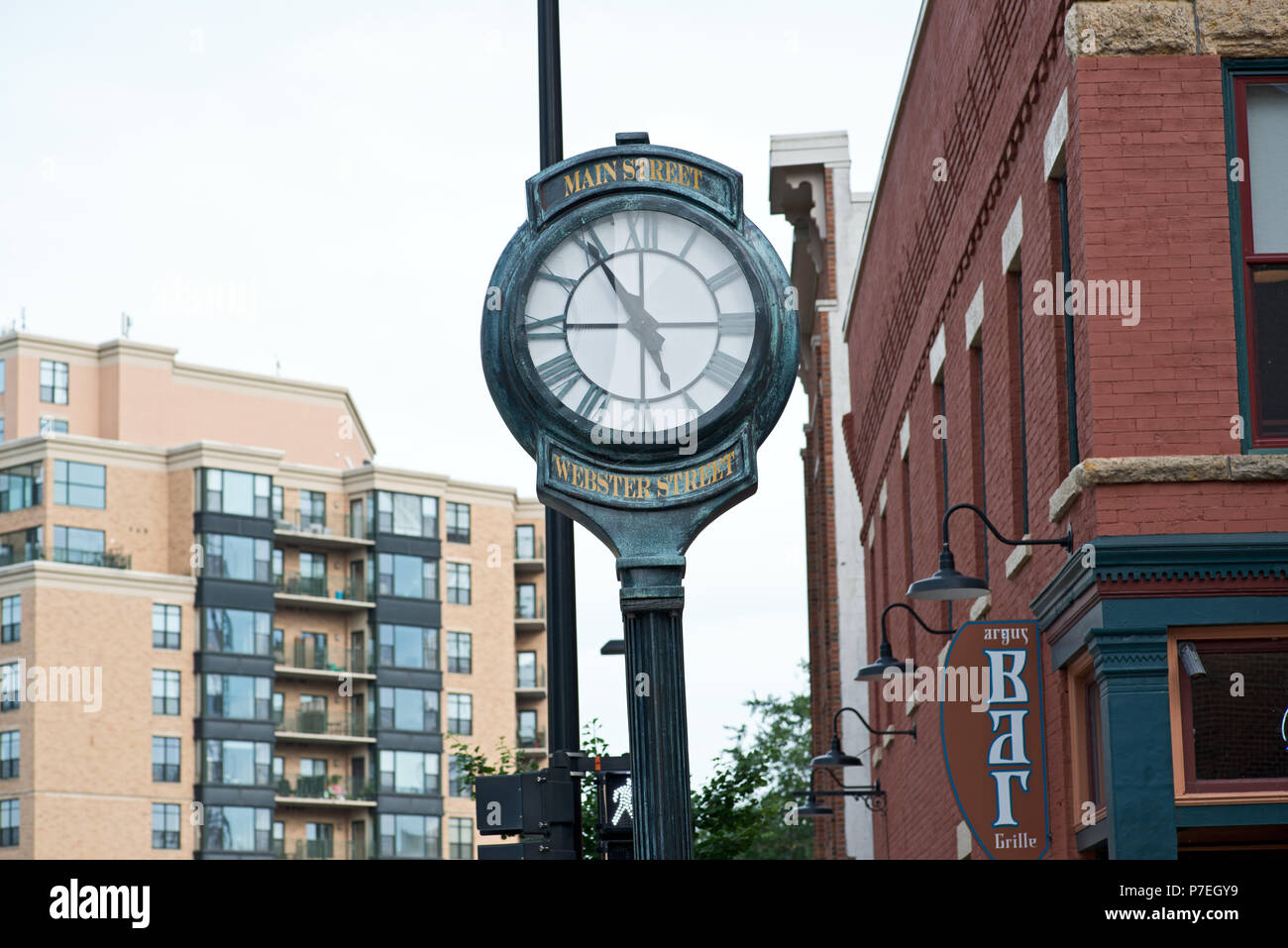 Old fashioned street clock in downtown of American city Stock Photo - Alamy