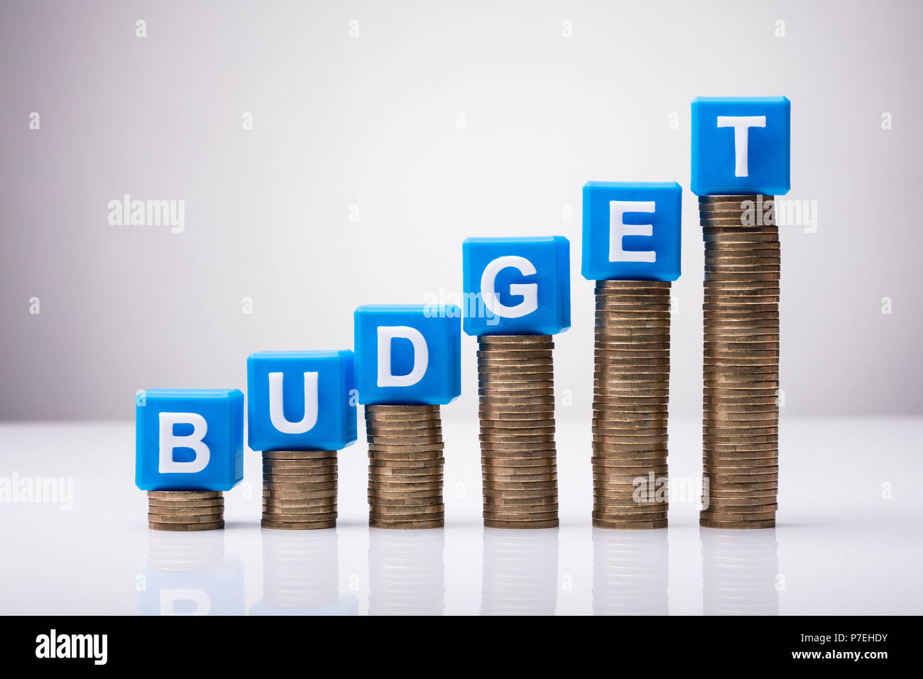 Gold word money blue background hi-res stock photography and images - Alamy