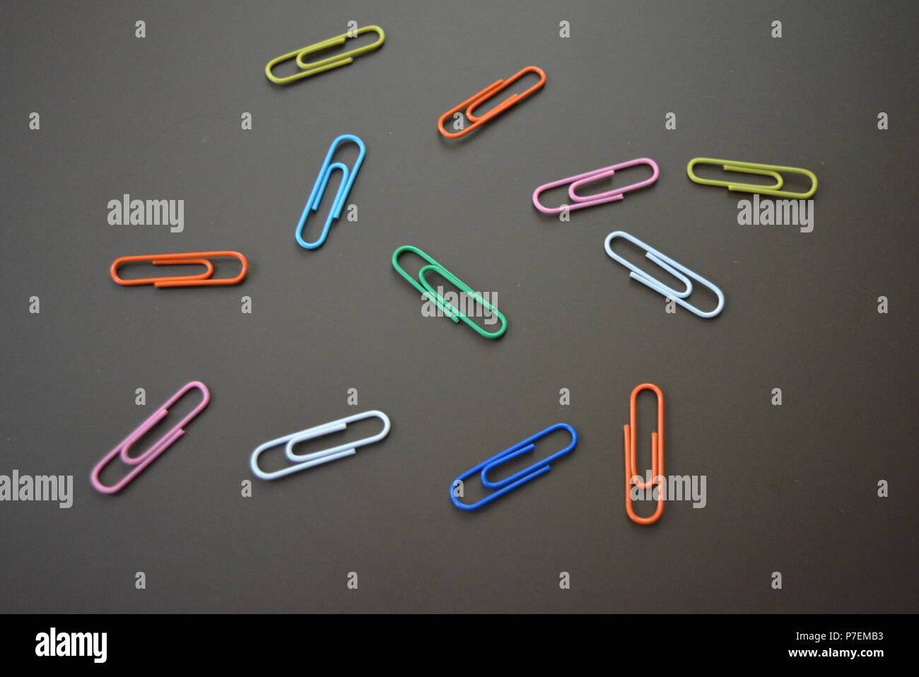 Color clips of different colors are scattered and multicolored clips ...