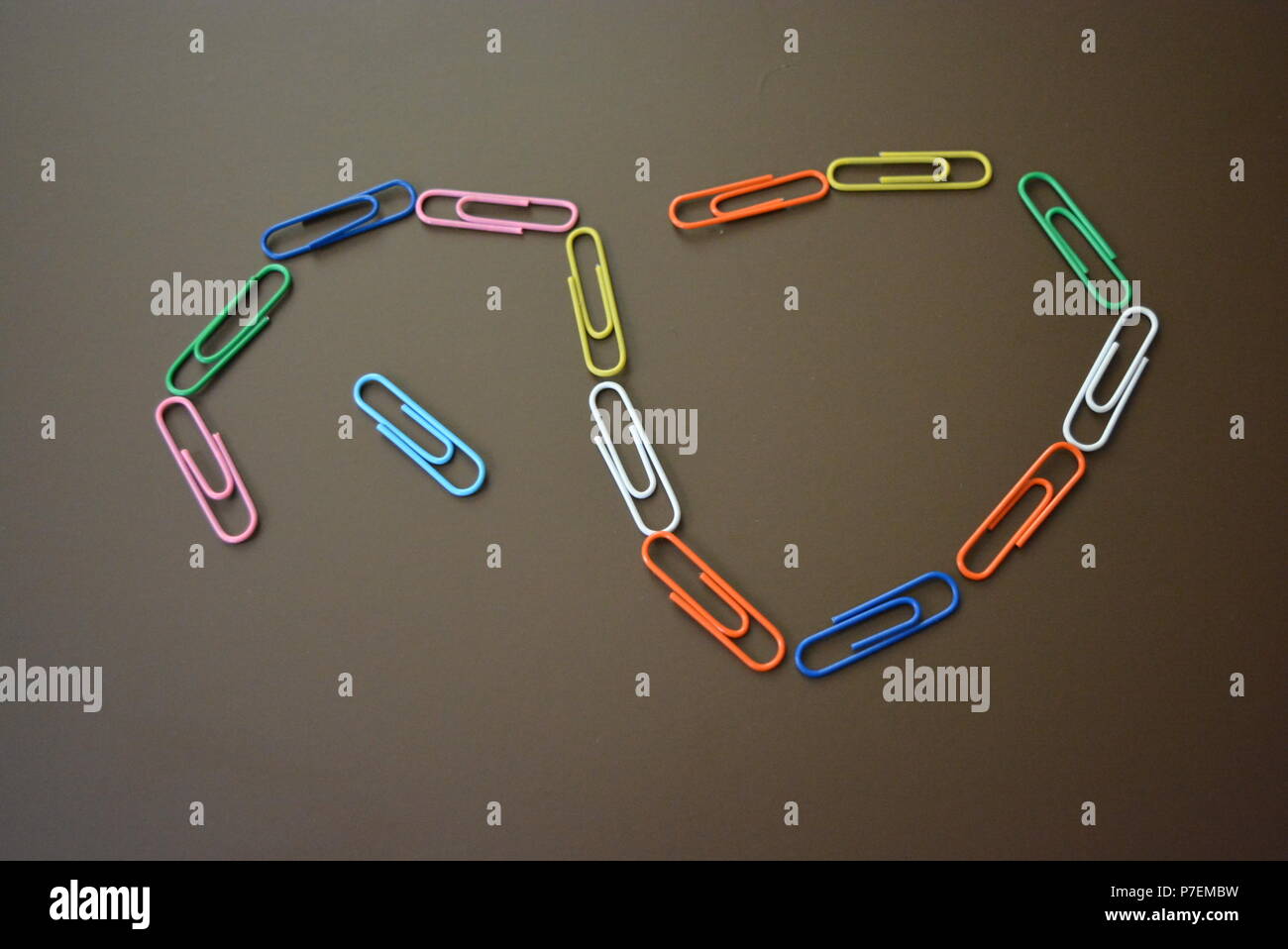 Color clips of different colors are scattered and multicolored clips ...