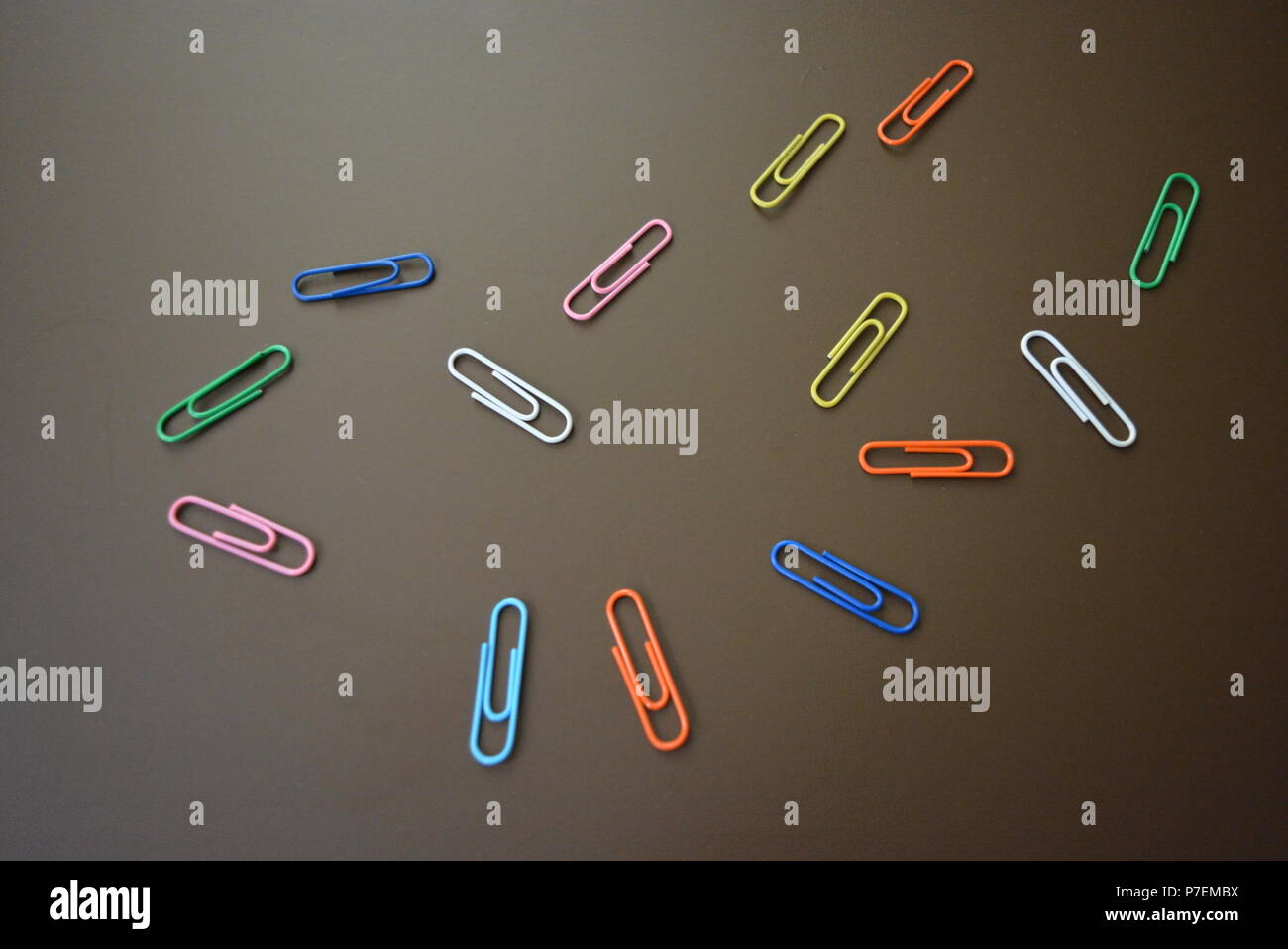 Color clips of different colors are scattered and multicolored clips ...