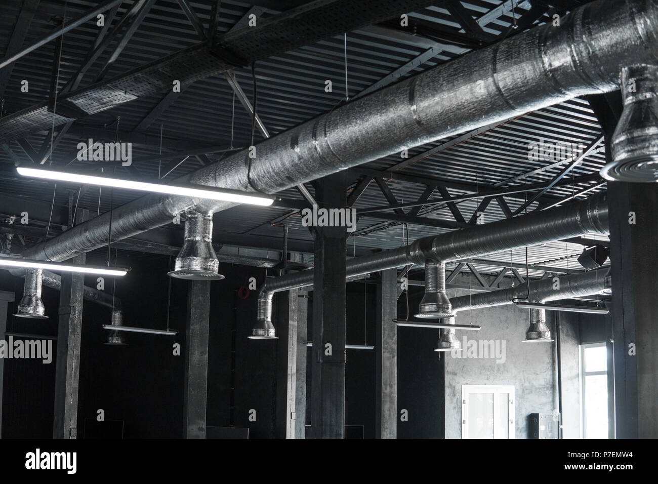 Ventilation system on the ceiling of large buildings. Ventilation pipes ...