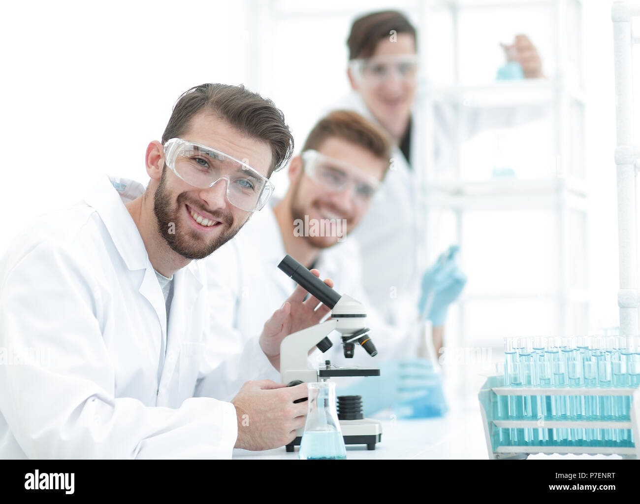 closeup.a group of scientists in the workplace Stock Photo - Alamy