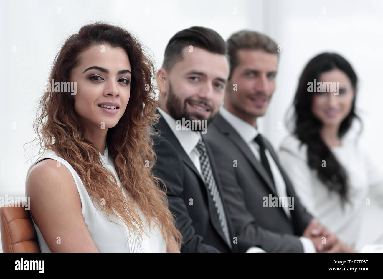 closeup.business team sitting in the conference room Stock Photo - Alamy