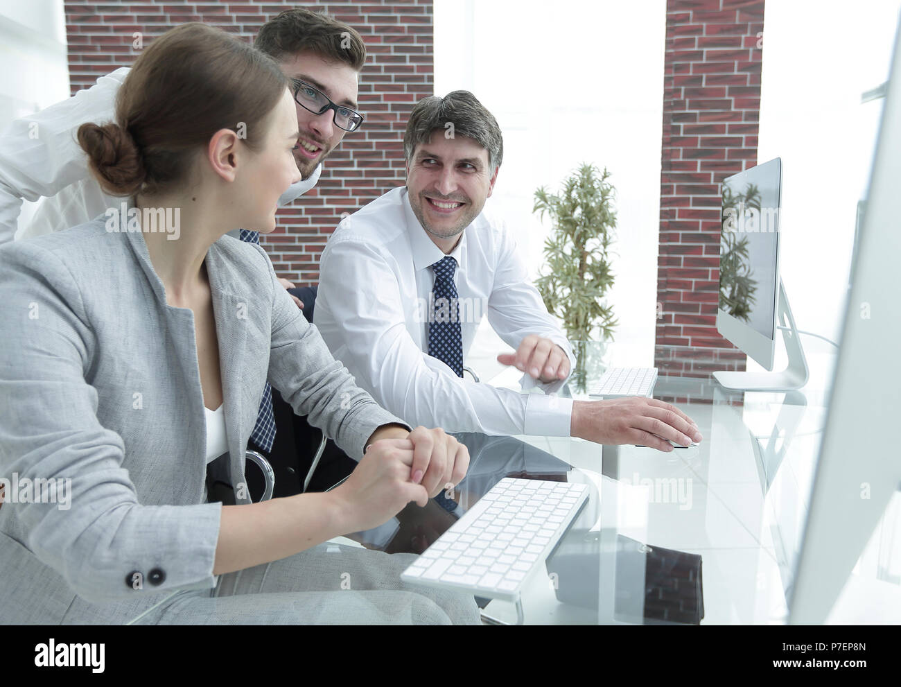 business team working in a computer room Stock Photo - Alamy