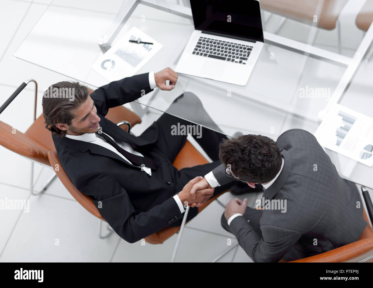 view from the top.handshake colleagues Stock Photo - Alamy