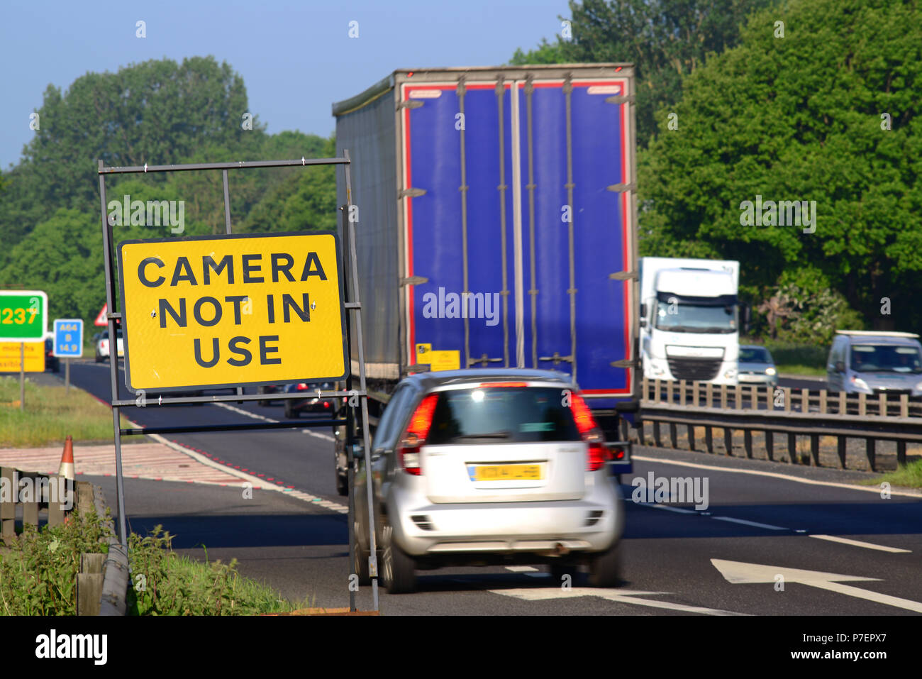 average speed camera not in use warning sign at roadworks for traffic ...