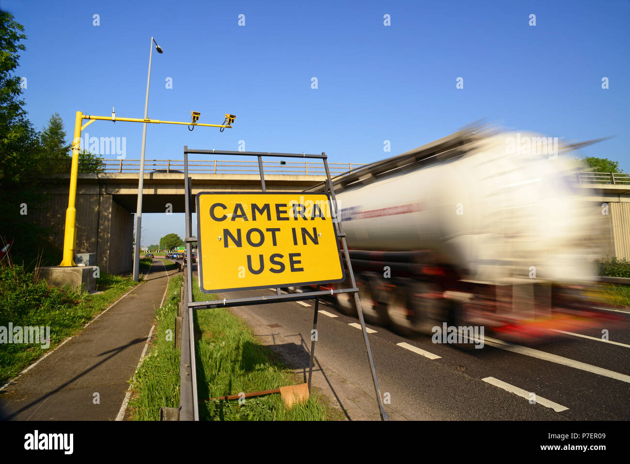 average speed camera not in use warning sign at roadworks for traffic ...